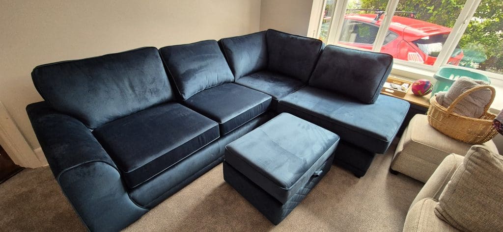 DFS Dark Blue Velvet Orka Corner Sofa + Footstool – Sofalistic | The ...