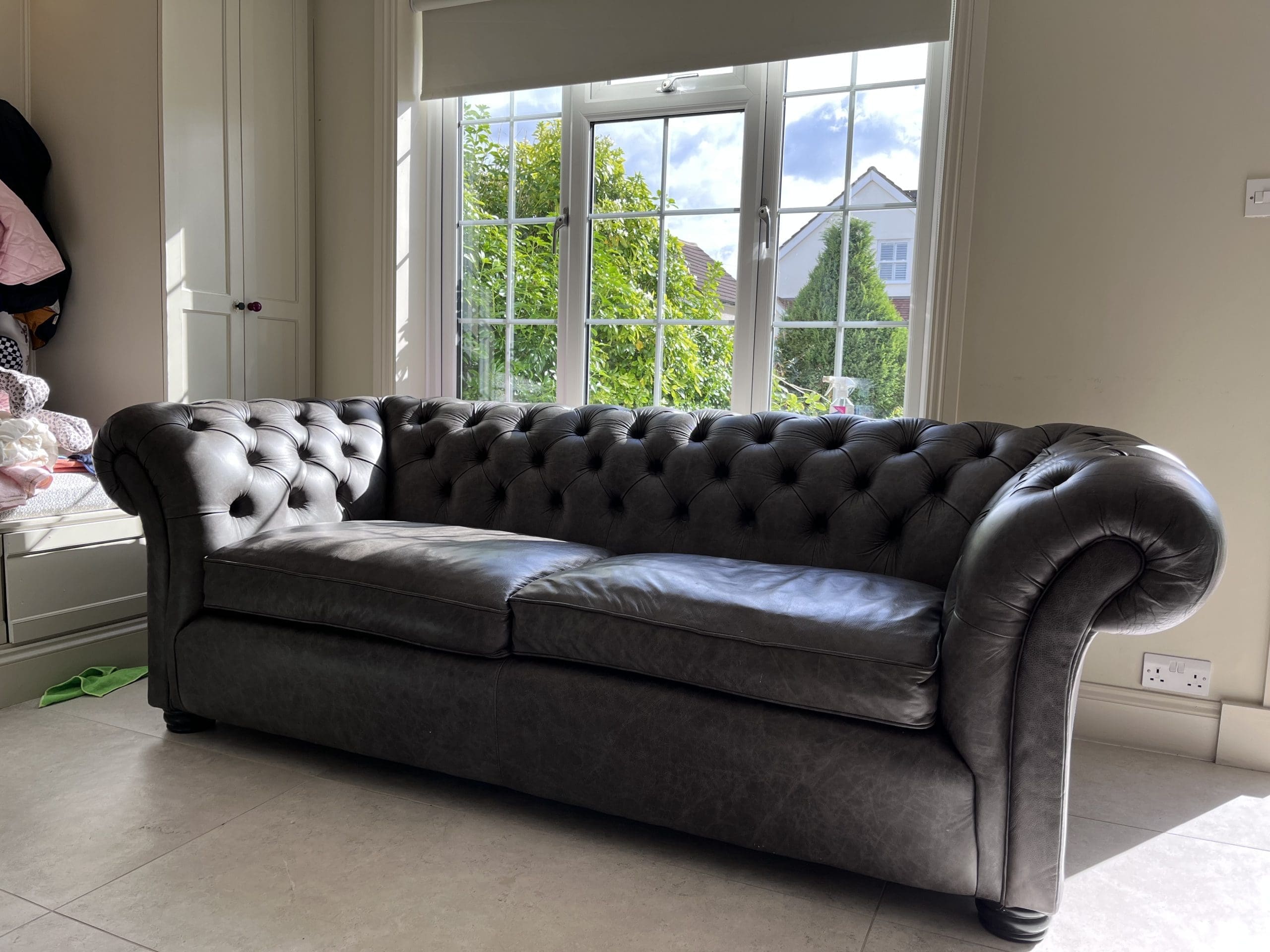Light grey calves leather chesterfield. hand made by Distinctive Chesterfields London Sofalistic The Sofa Marketplace buy and sell preloved sofas nationwide
